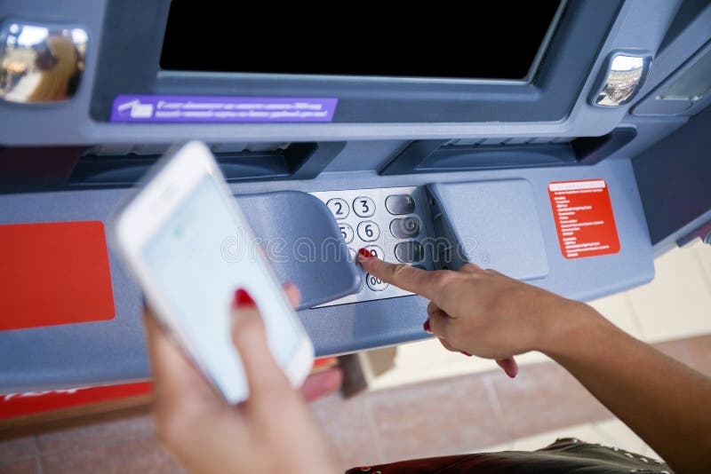 Close Up of Hand Entering Pin at an ATM. Finger about To Press a Stock ...