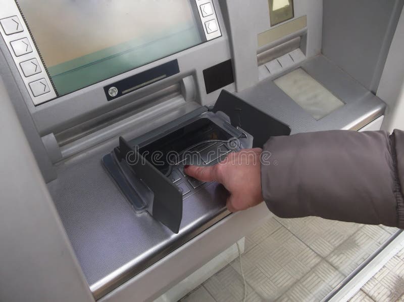 Close Up of Hand Entering Pin at an ATM. Finger about To Press a Pin ...