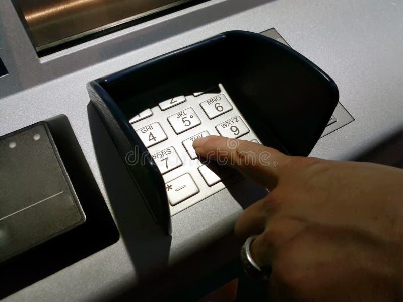 Close Up of Hand Entering Pin at an ATM. Female Arms, ATM - Entering ...