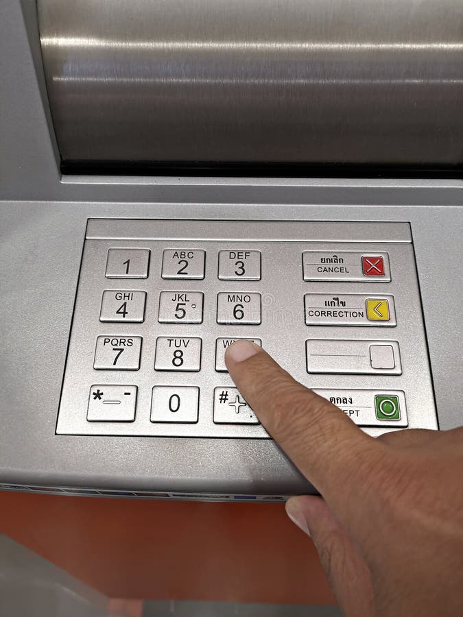 Close-up of Hand Entering PIN Pass Code on ATM Bank Machine Keypad ...