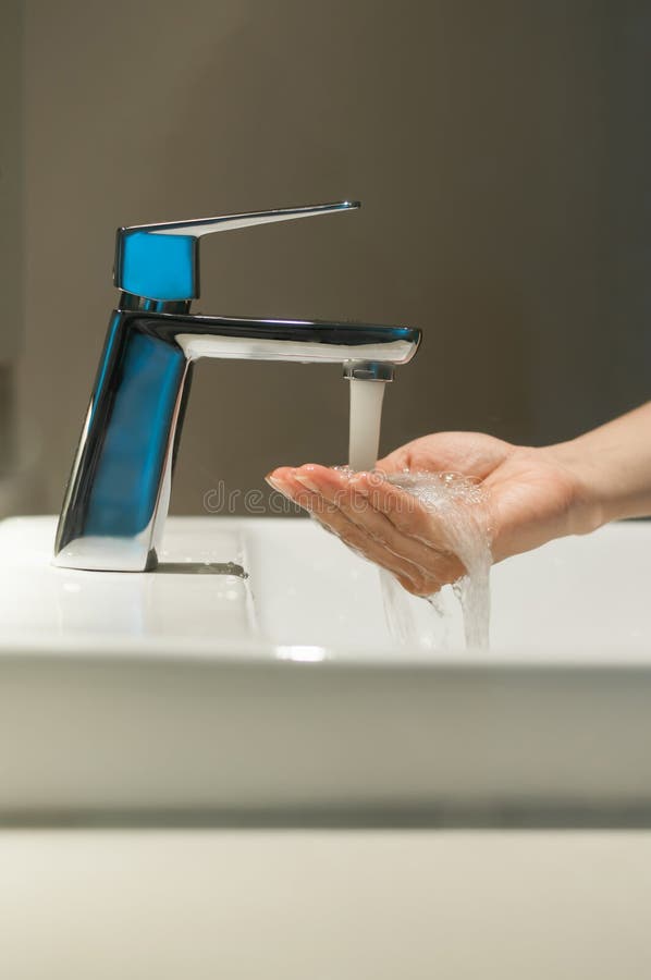 Close Up of Hand with Faucet and Water Flow. Stock Photo - Image of ...