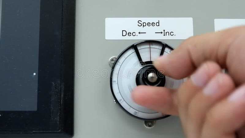 Close Up Hand Grap and Turn Knob of Scale Dial Meter Rotation Decrease ...