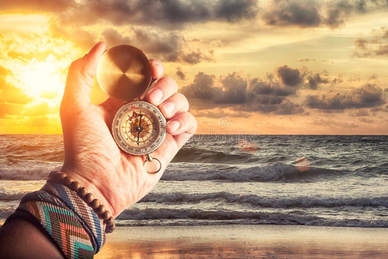 Hand holding compass stock image. Image of compass, arrow - 117897241