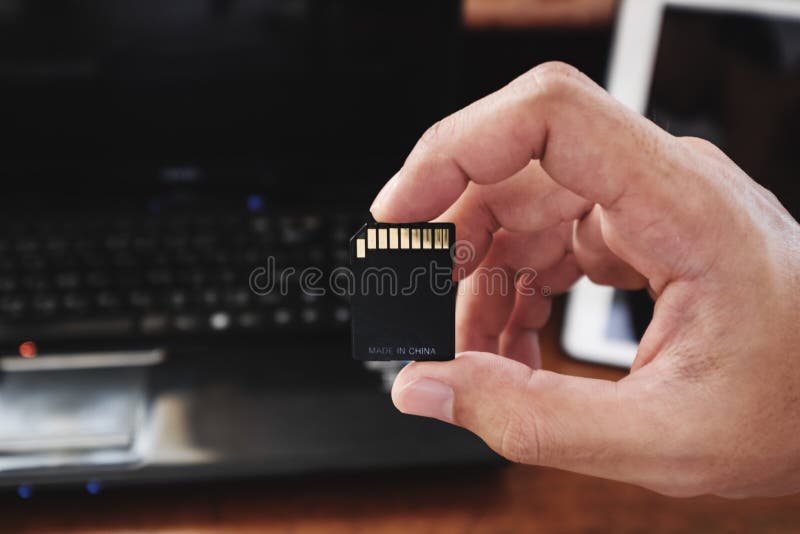 Close-up Hand Holding Memory Card, Made in China Technology Product ...