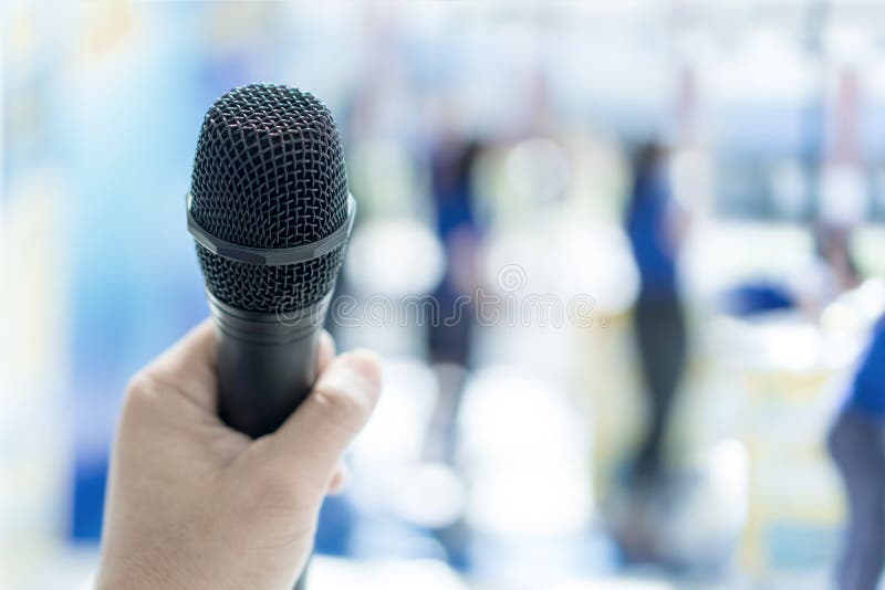 Close Up of Hand Holding Microphone Stock Image - Image of closeup ...