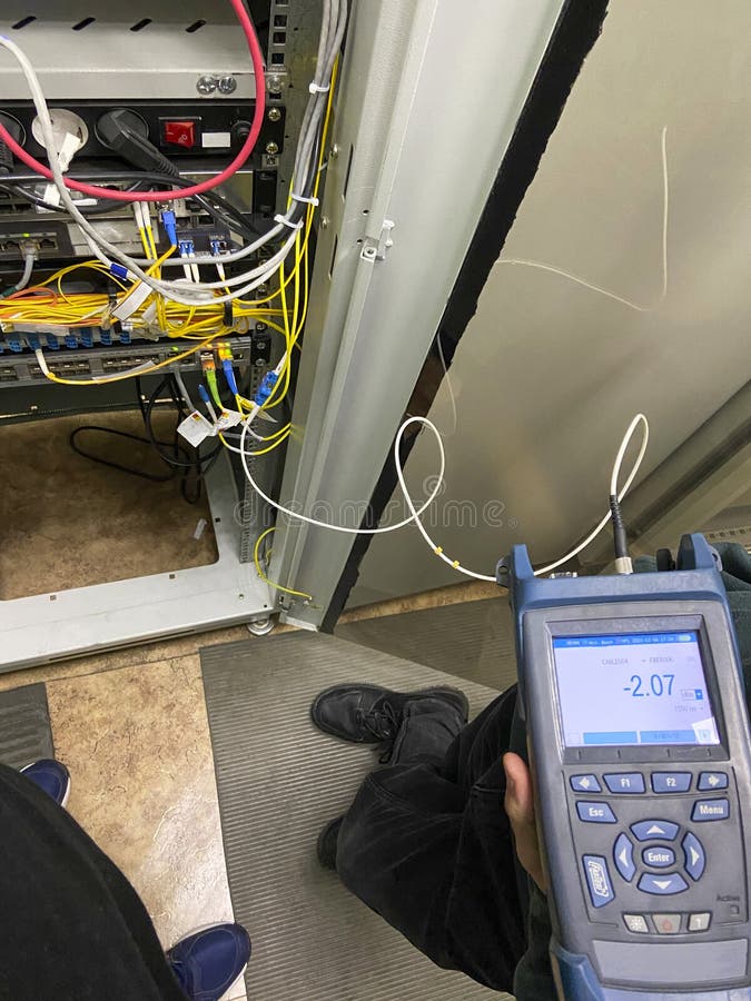 Close-up of a Hand Holding a Power Meter. Power Meters are a Toolbox ...