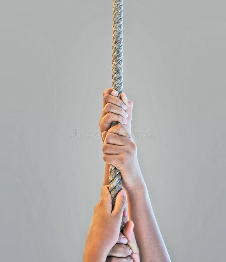 Close up hand holding rope stock image. Image of cooperation - 62173255