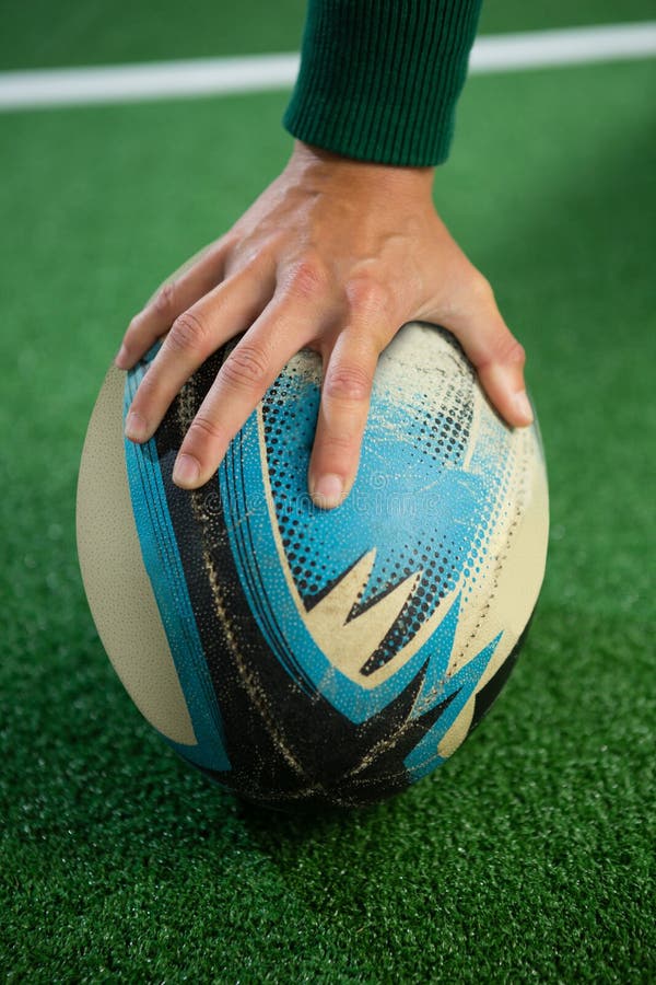 Close Up of Hand Holding Rugby Ball Stock Image - Image of activity ...