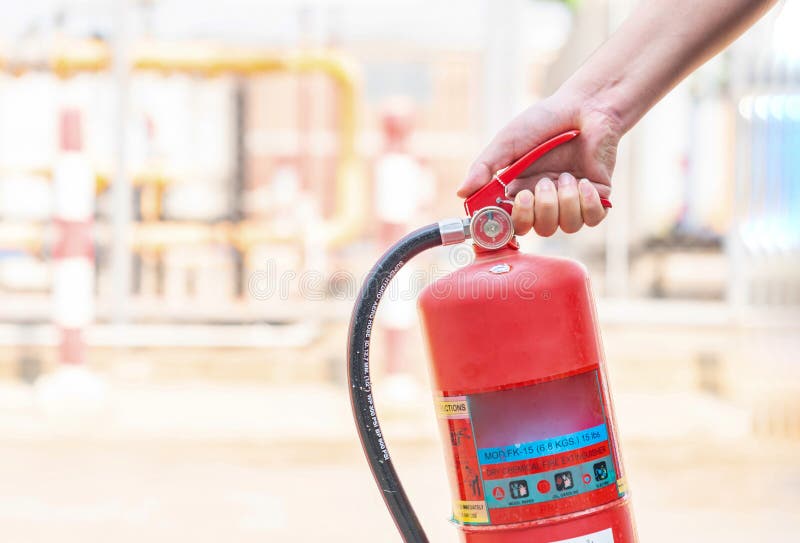 Close Up Hand Holding a Hand To Catch Fire Extinguishers Stock Photo ...