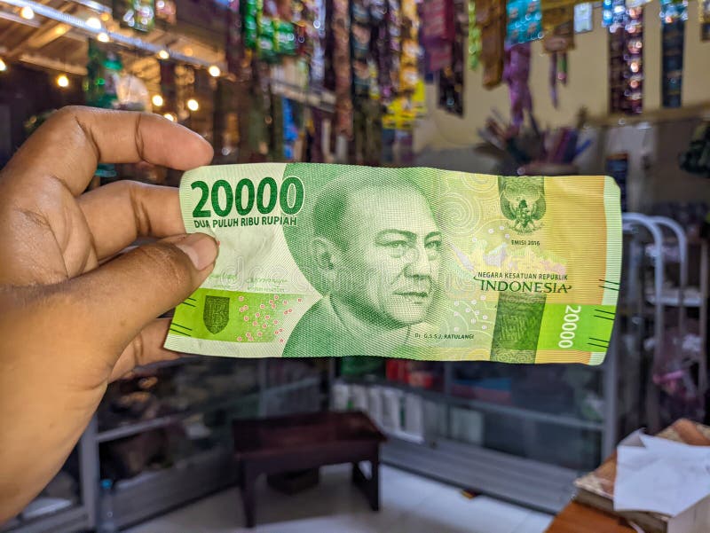 A Close Up of a Hand Holding Twenty Thousand Rupiah Stock Photo - Image ...