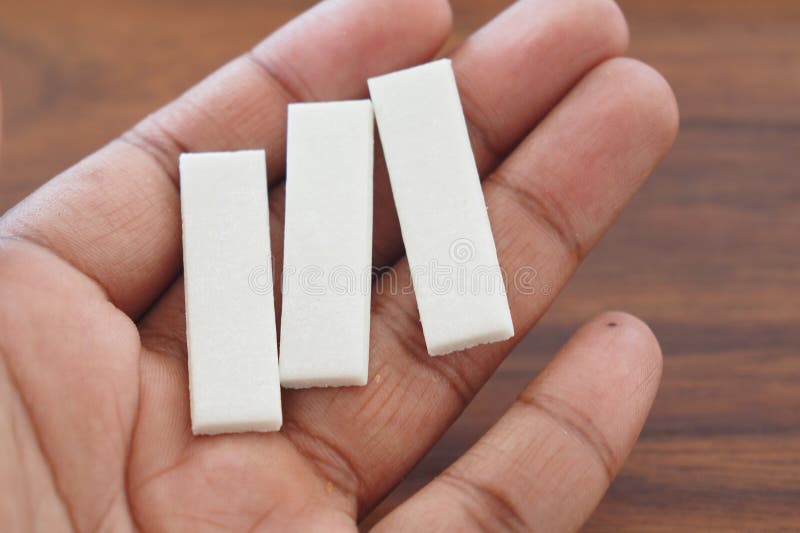 Close-Up of Hand Holding White Chewing Gum Pieces Stock Image - Image ...
