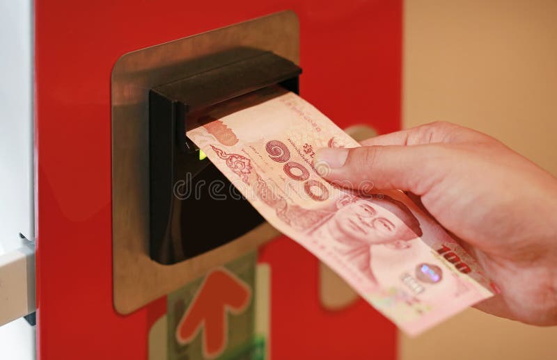 Hand Inserting Banknote into Vending Machine Stock Photo - Image of ...