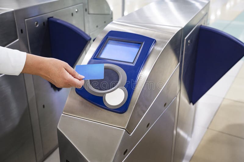 Close-up Hand with Keycard at Pedestrian Access Control Flap Barriers ...