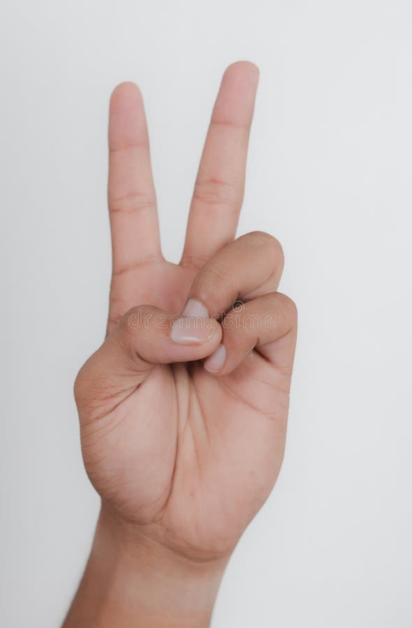 Hand Signs the Lighting is Neutral, Highlighting the Natural Skin Tones ...