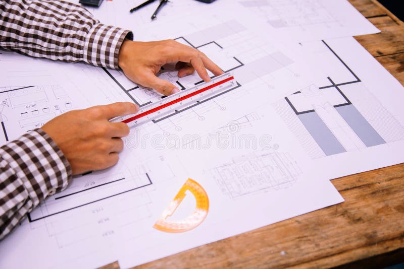 Close-up Hand of Male Architect Drawing Blueprint on Work Space in ...