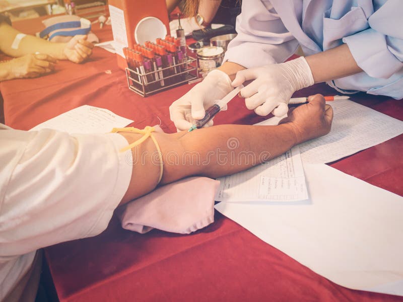 Close Up Hand Man and Nurse Taking a Blood Sample with Vintage Stock ...