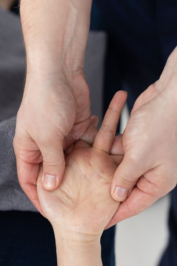 Close-up of Hand Massage.a Woman Receives a Hand Massage from a ...