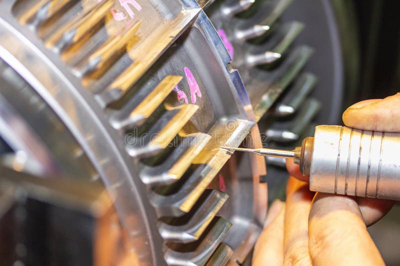 Close Up Hand of Operator Use a Grinder Tool To Polish and Decorate ...