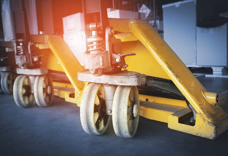 Close Up, Hand Pallet Truck in the Warehouse. Work Tools for Unloading ...