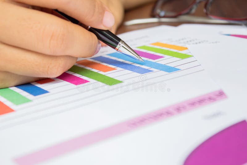 Close-up of Hand with Pen Over Graph Stock Photo - Image of human ...