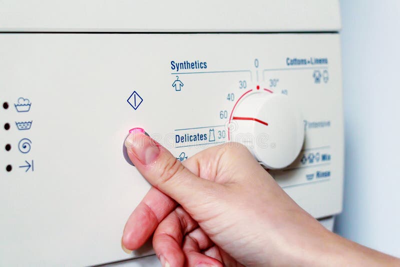 Close Up Hand Presses Start on Washing Machine Stock Image - Image of ...