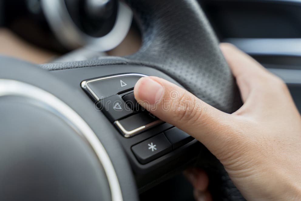 Close-up Hand Pressing Car Steering Wheel Control Button for Vehicle ...