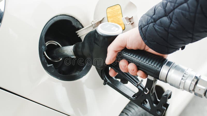 Close Up of Hand Puts Fuel Pump into Car Stock Photo - Image of biofuel ...
