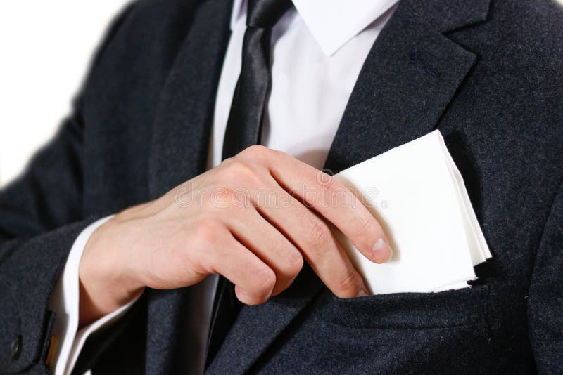 Close Up Hand Puts a White Handkerchief in the Pocket of His Black ...