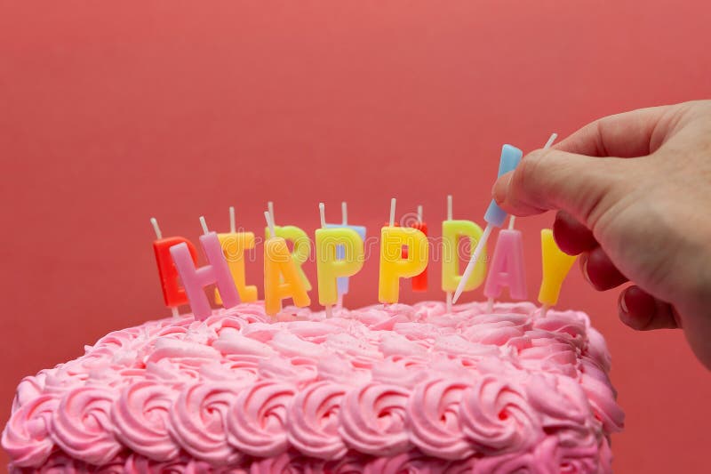 Close-up of Hand Putting Cake Candle on Birthday Cake with Copy Space ...