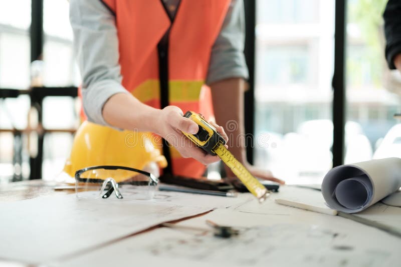 Close Up of Hand& X27;s Architects Working on Blueprints in the Office ...