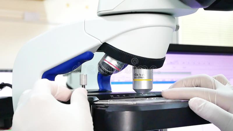Close Up Hand Scientist Using Light Microscope. Stock Video - Video of ...