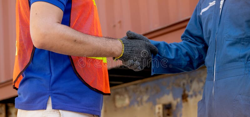Close Up Hand Shaking of Cargo Container Worker or Engineer in ...
