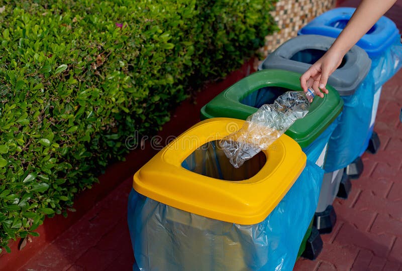 Close Up Hand Throwing Plastic Bottle Recycling Container Garbage ...