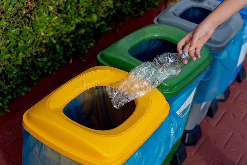 Close Up Hand Throwing Plastic Bottle Recycling Container Garbage ...