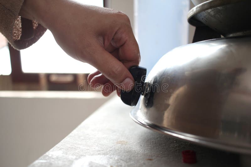 Close Up of Hand Turning on Fire on Stove, Ready To Cook Stock Image ...