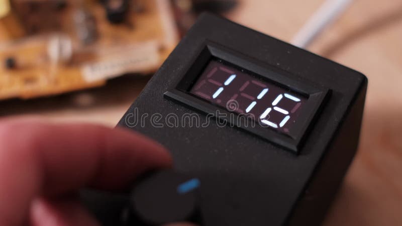 Adjusting Voltage Regulator Knob Increases Digital Display Value Stock ...