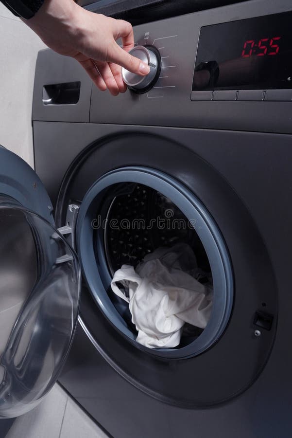 Hand Adjusting Washing Machine Program Dial Stock Image - Image of ...