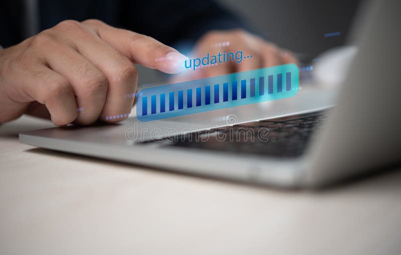 Close Up of Hand Updating Software on Laptop Digital Progress Bar ...