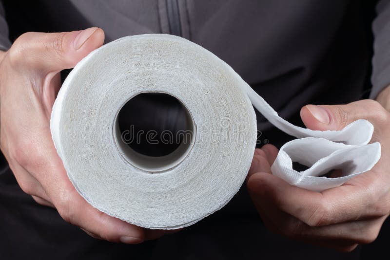 Close-up of in Hand Using a Toilet Paper Stock Image - Image of roll ...