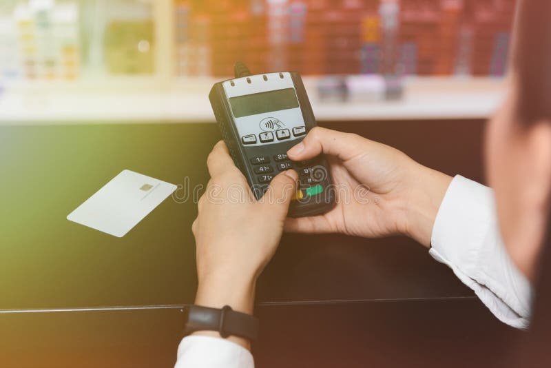 Close Up Hand of Woman`s Hands Inserting Pin Code on Credit Card ...