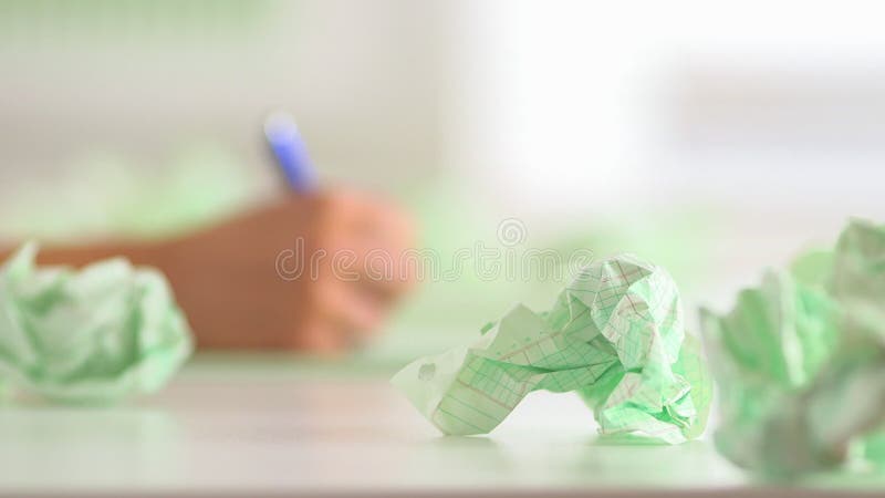 Close Up of Hand Writing with Crumpled Paper on Desk Stock Video ...