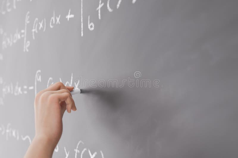 Close-Up of Hand Writing Mathematical Formulas on Blackboard Stock ...