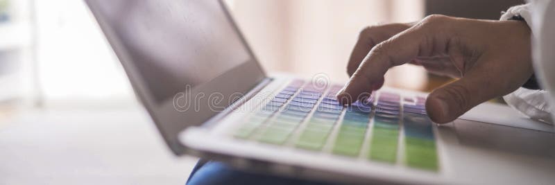 Close Up of Hand Writing and Typing on Laptop Keyboard. Concept of ...