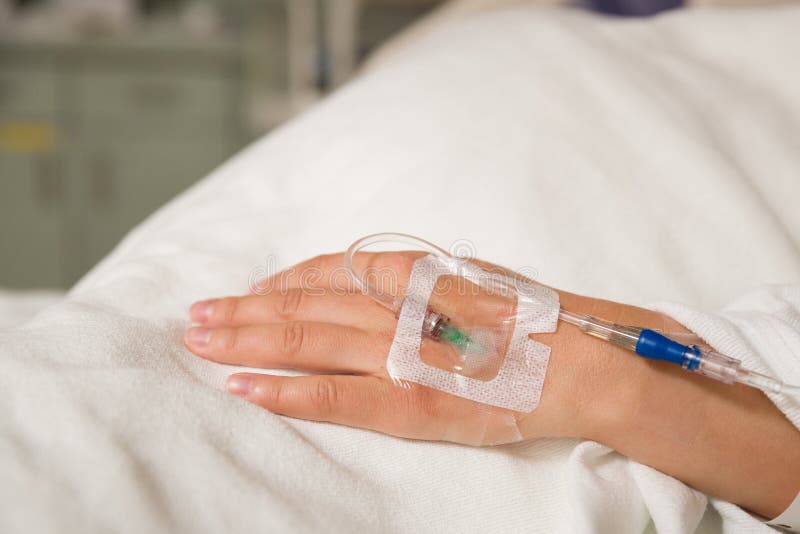 Close Up Hand of Young Patient with Intravenous Catheter for Injection ... Close Up Hand of Young Patient with Intravenous Catheter for Injection ...