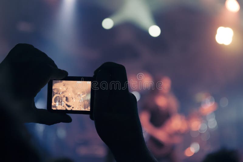 Filming A Concert On Mobile Phone Camera, Stage Blue Light Stock Image ...