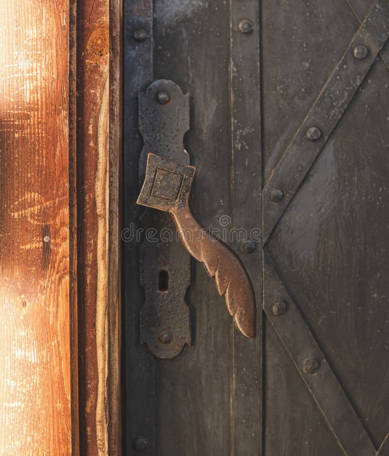 A Close-up of the Handle on an Old Metal Door Stock Image - Image of ...
