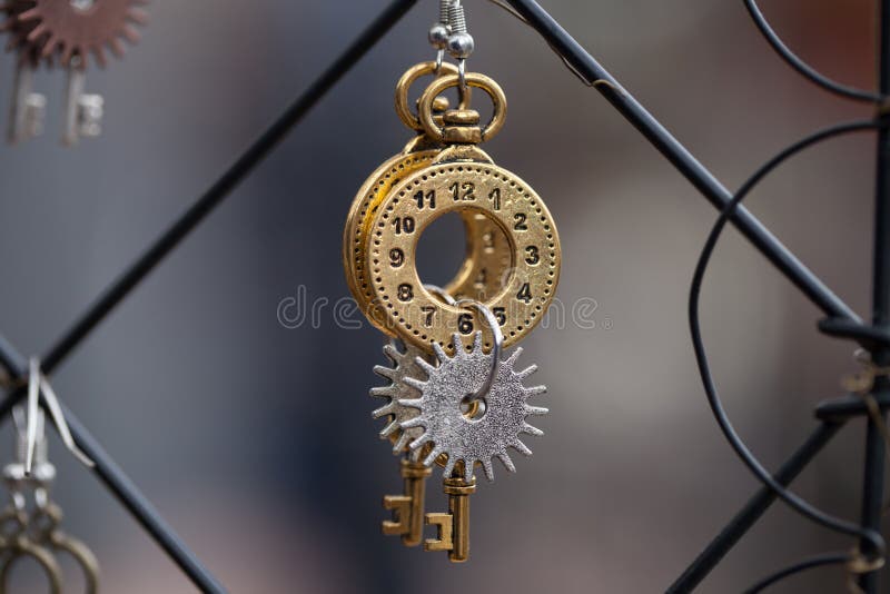 Close Up of Handmade Golden and Silver Earrings, with Clock Dial, Key ...