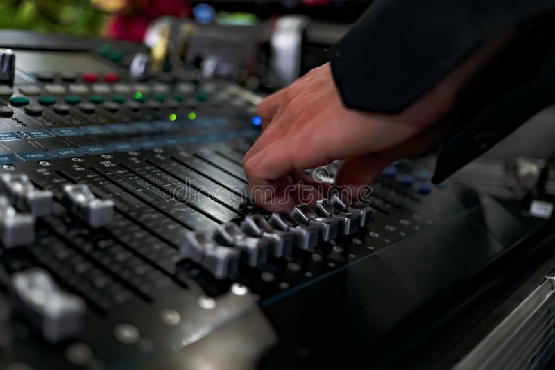 Close-up of Hands Adjusting Sound on Music Controller. Sound Music ...