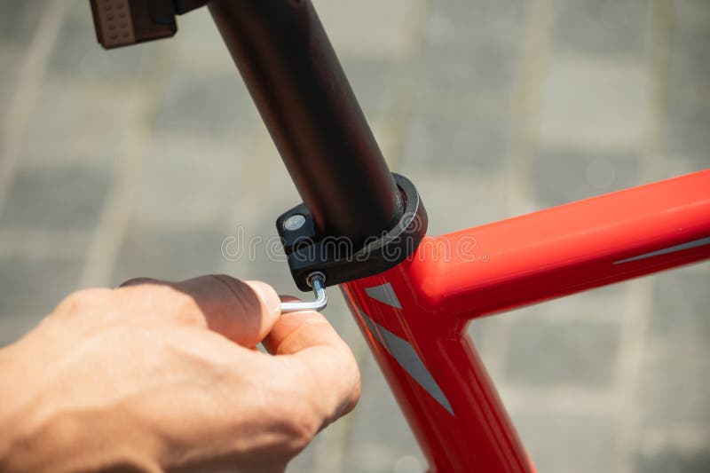 Adjusting Bicycle Seat with Hex Key Tool Stock Image - Image of biking ...