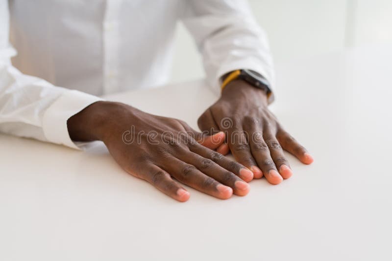 Close Up of Hands of African Man Over Table Stock Image - Image of body ...